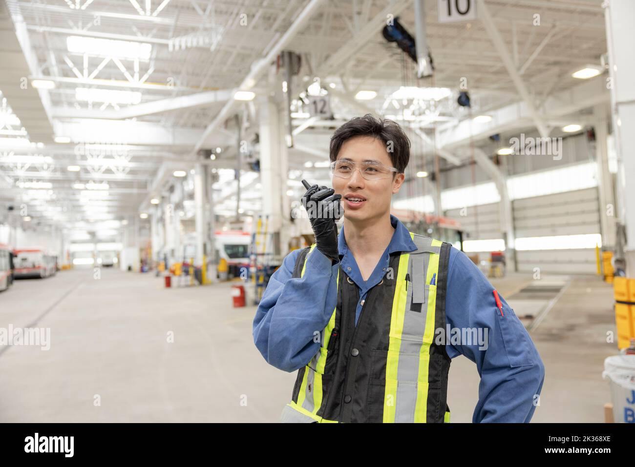 Male worker talking hi-res stock photography and images - Alamy
