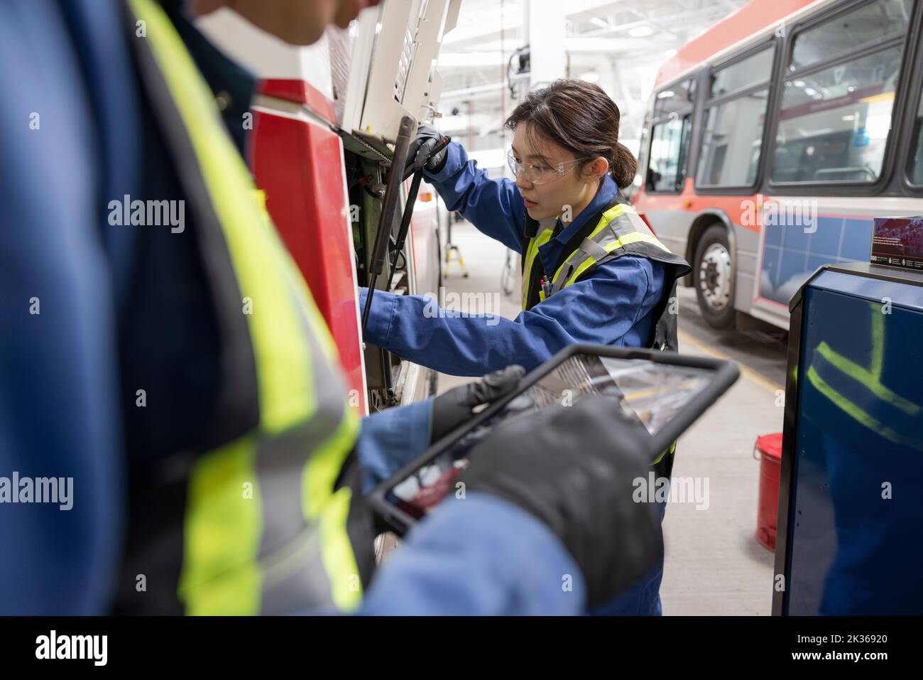 Mechanic fixing bus hi-res stock photography and images - Alamy