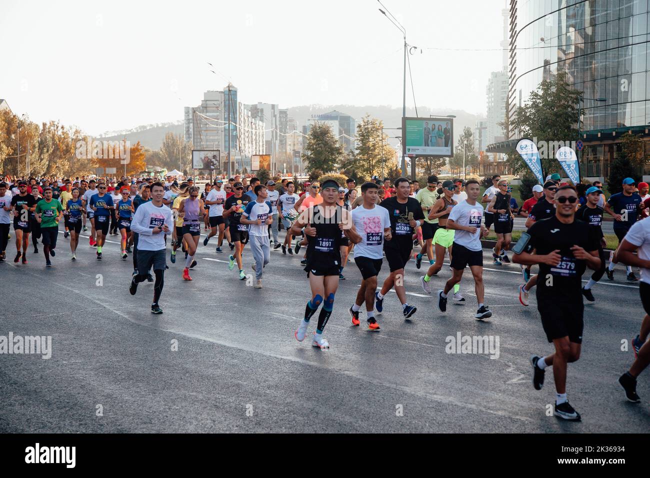 Kazakhstan, Almaty-September 25, 2022: Almaty marathon. People run down ...