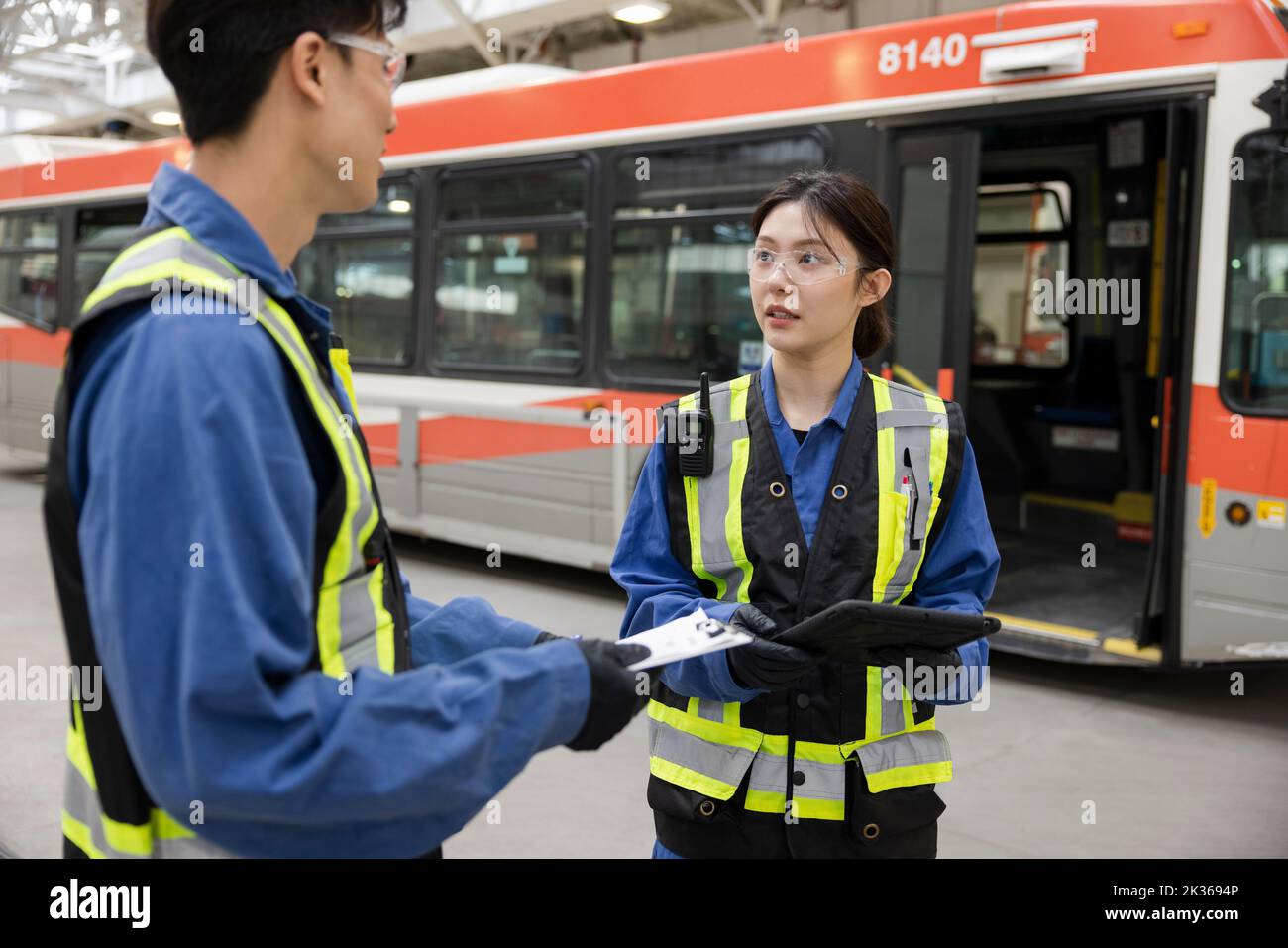 Man and women in bus hi-res stock photography and images - Alamy