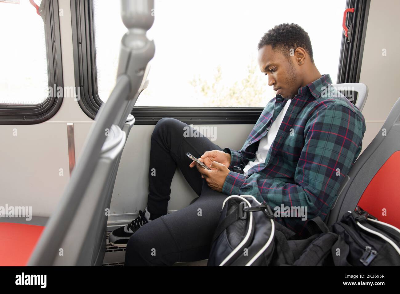 Man using public transportation hi-res stock photography and images - Alamy