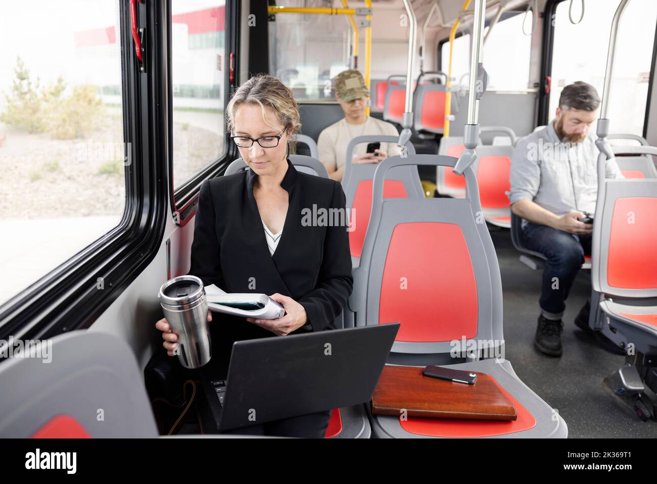 Bus passenger working on laptop hi-res stock photography and images - Alamy
