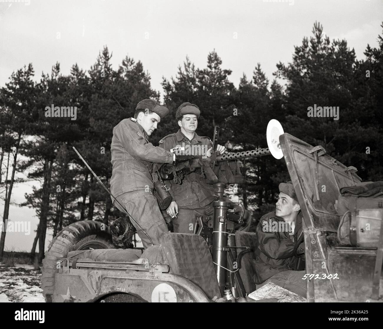 Sgt Elvis Presley Checks Machine Gun of the 32nd Armor Scout Jeep ...