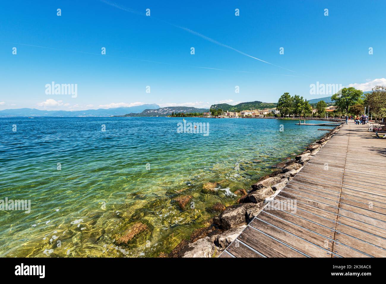 Coast of Lake (Lago di Garda) near the small town of Bardolino, tourist ...