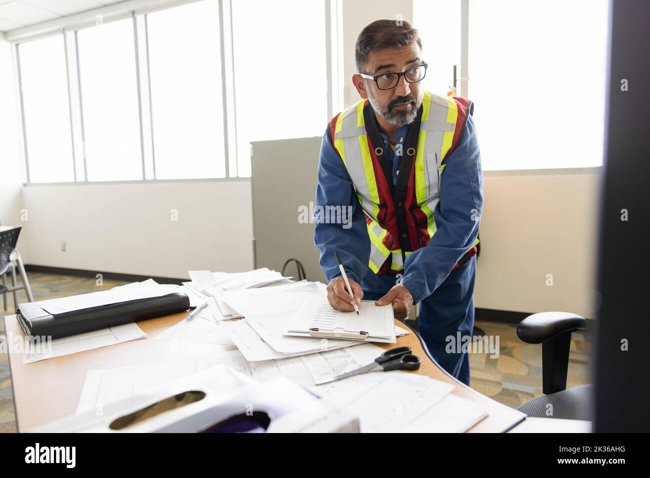 Supervisor table hi-res stock photography and images - Alamy