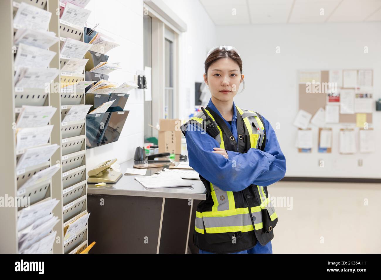 Portrait confident female maintenance facility worker in office Stock ...