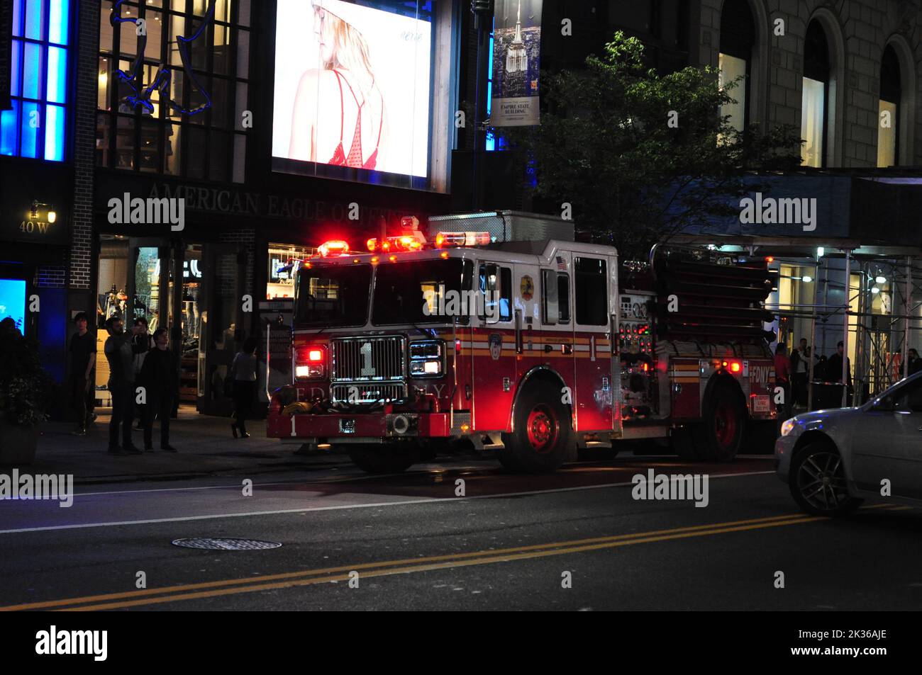 Fire truck at night with lights on hi-res stock photography and images ...