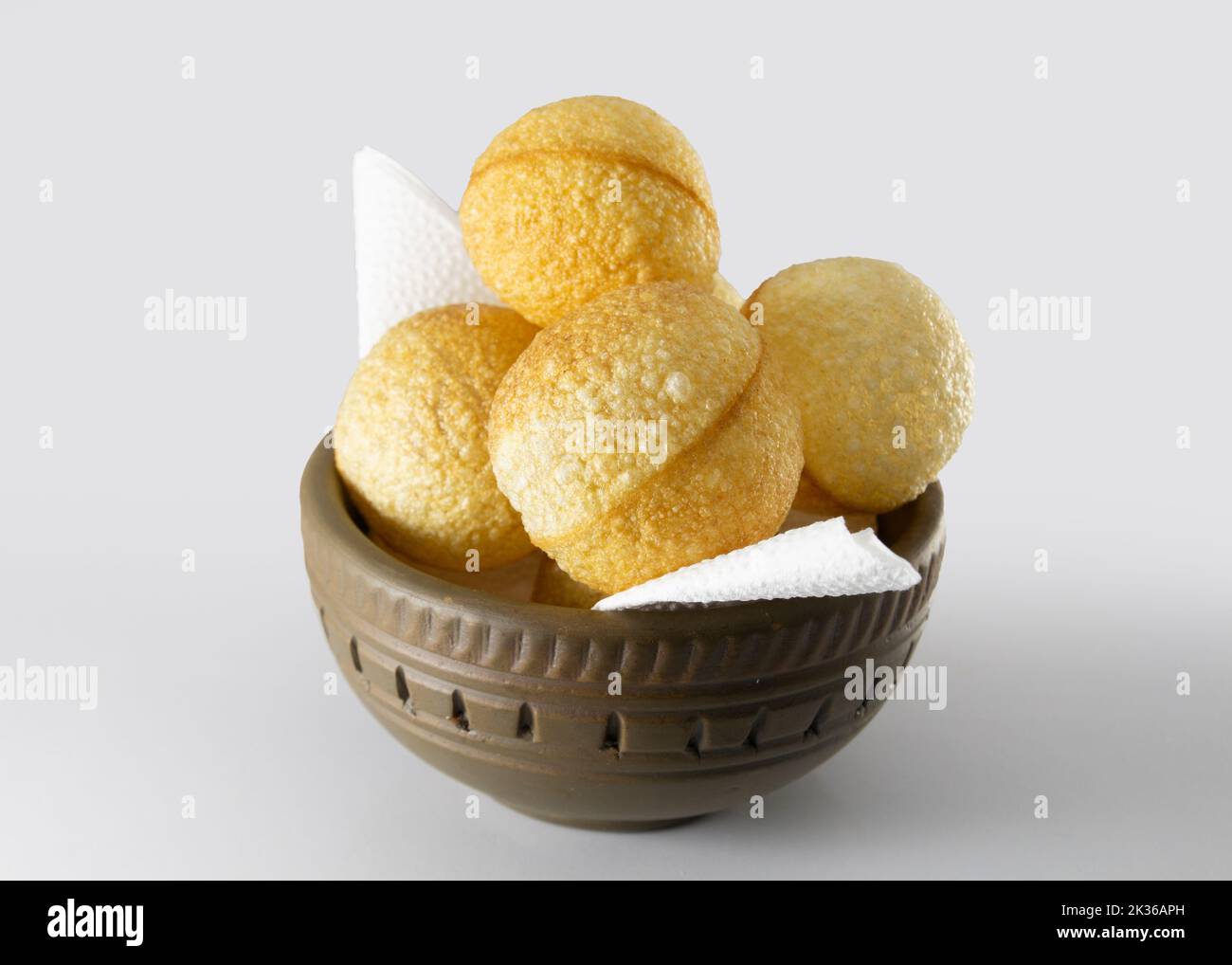 A bowl full of Fuska or golgappe with dal. popular evening snacks in ...