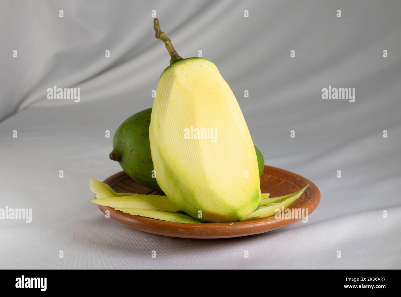 Clay plate green fruit hi-res stock photography and images - Alamy