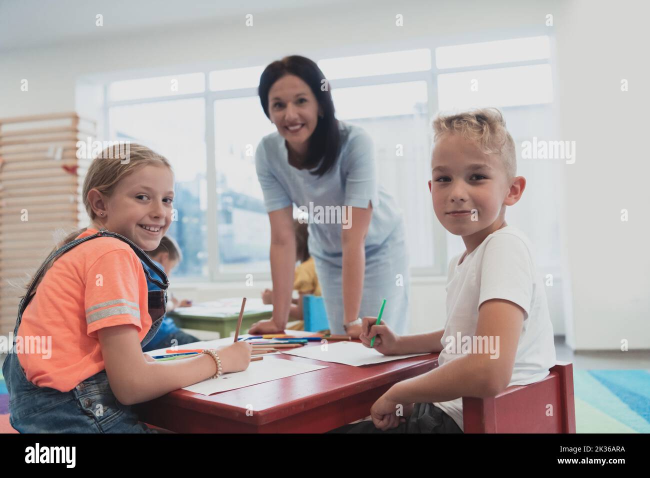 Creative kids during an art class in a daycare center or elementary ...