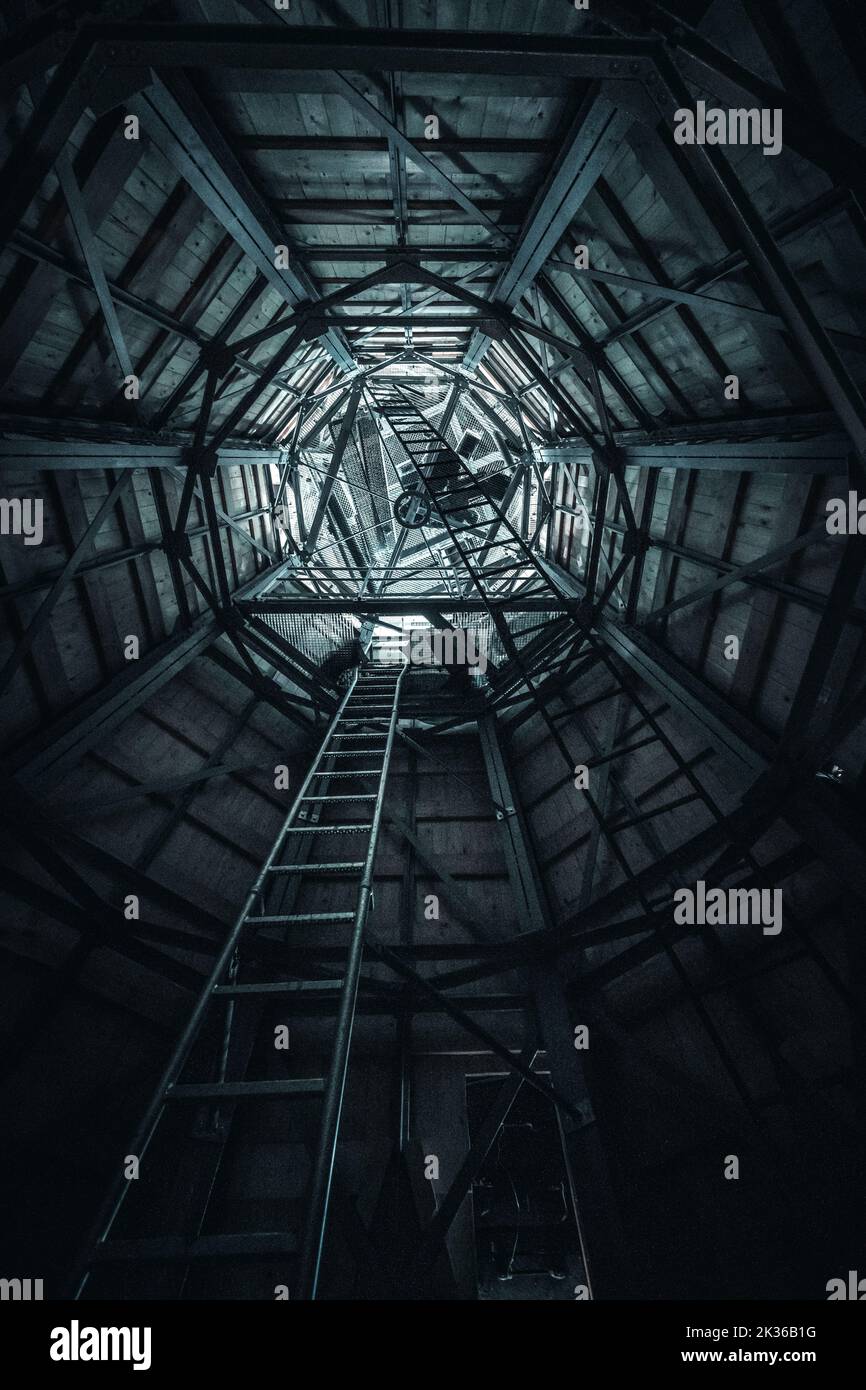 A low angle shot of an interior of a shaft with metal bars Stock Photo ...