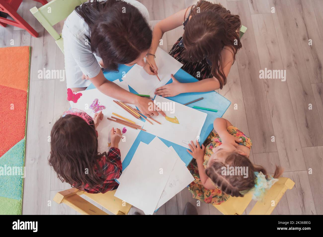 Creative kids during an art class in a daycare center or elementary ...