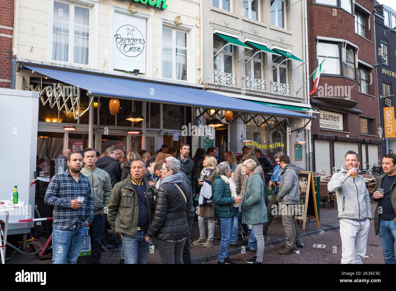 People clebrating a party in fornt of a cafe in the Netherlands Stock ...