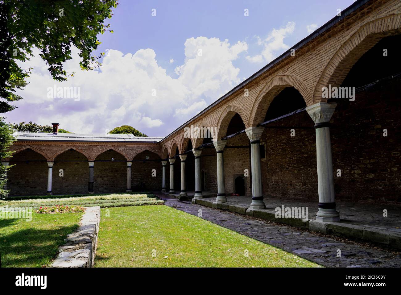 column and arches located outside the walls of kitchens and servants ...