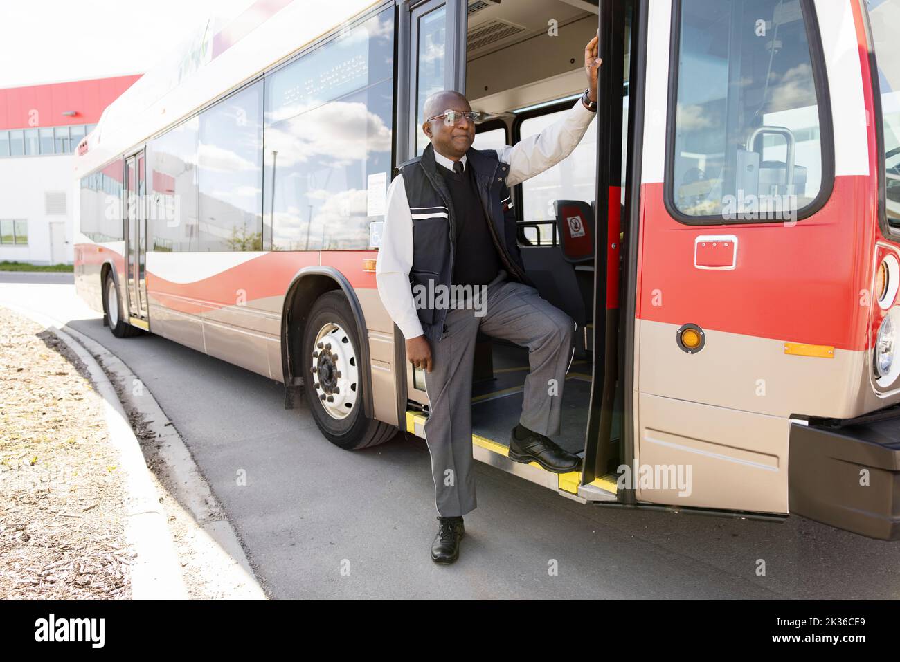 Bus standing full length hi-res stock photography and images - Alamy