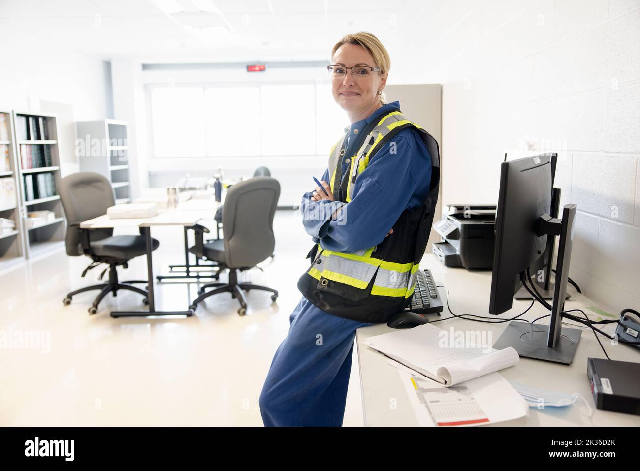 Portrait confident female maintenance facility worker in office Stock ...