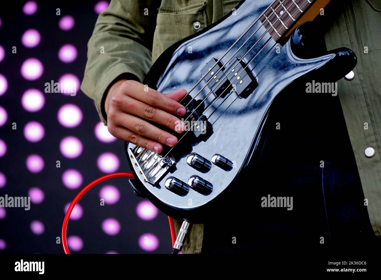 artist play guitar on a stage Stock Photo - Alamy