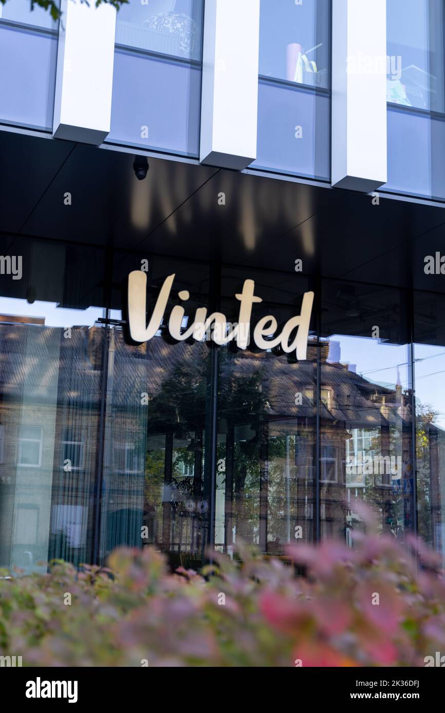 Vinted logo sign on main office, headquarters building wall. Vinted is ...