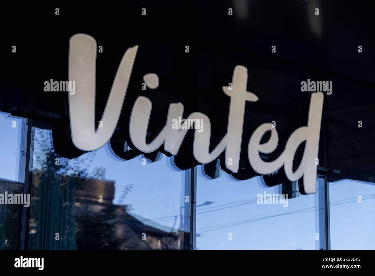 Vinted logo sign on main office, headquarters building wall. Vinted is ...