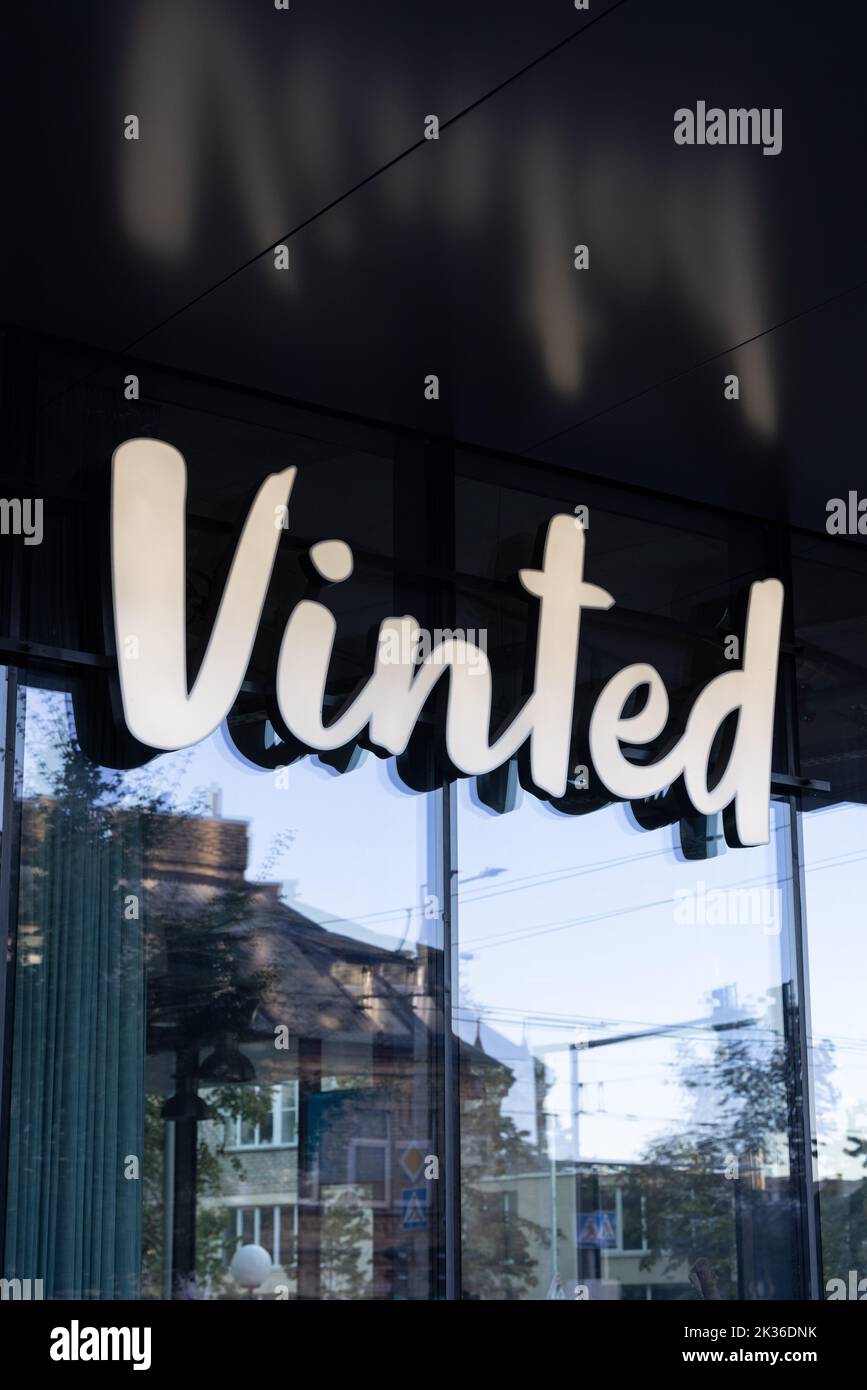 Vinted logo sign on main office, headquarters building wall. Vinted is ...