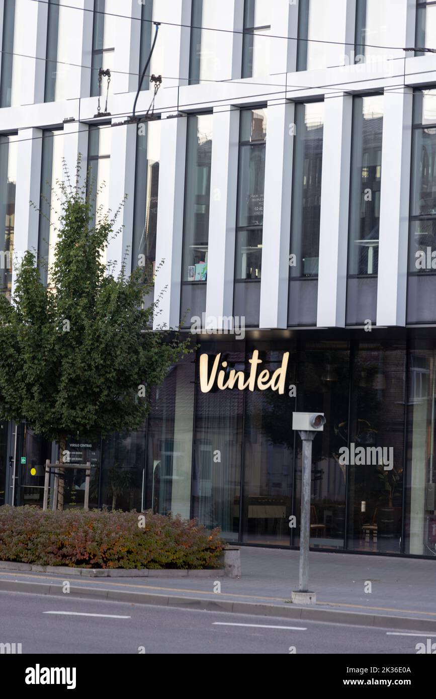 Vinted logo sign on main office, headquarters building wall. Vinted is ...