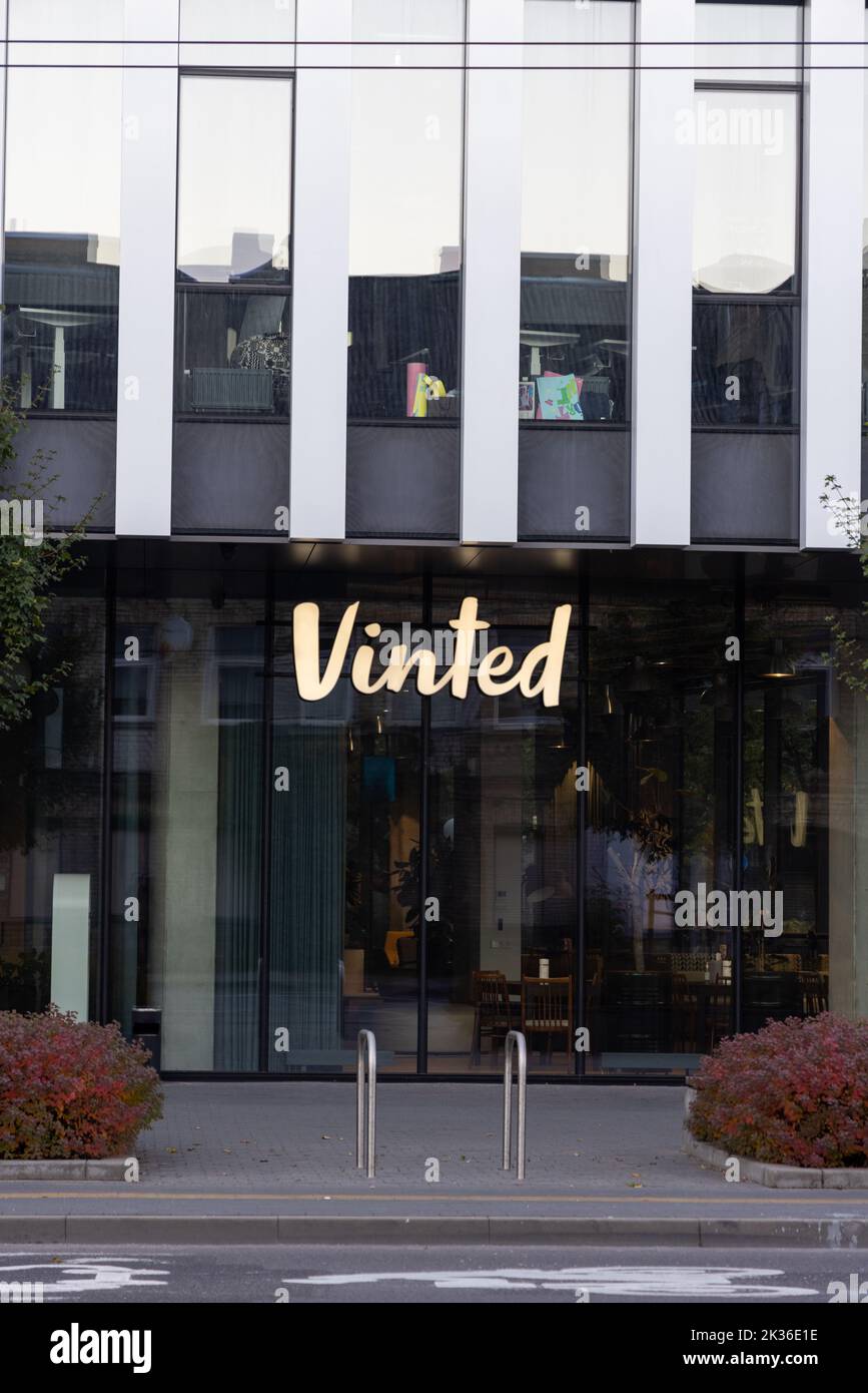 Vinted logo sign on main office, headquarters building wall. Vinted is ...