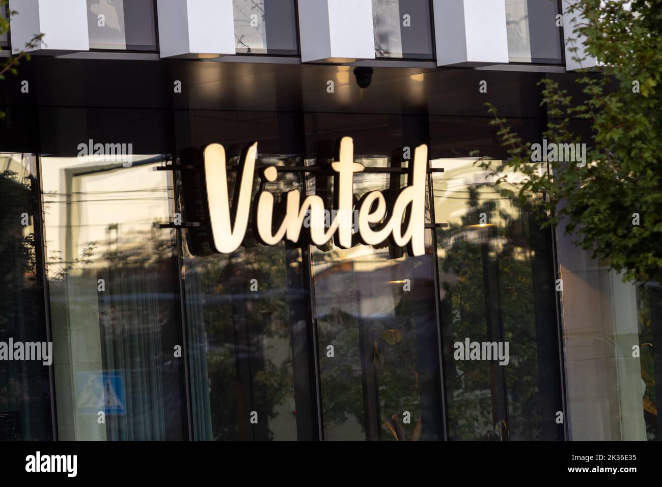Vinted logo sign on main office, headquarters building wall. Vinted is ...