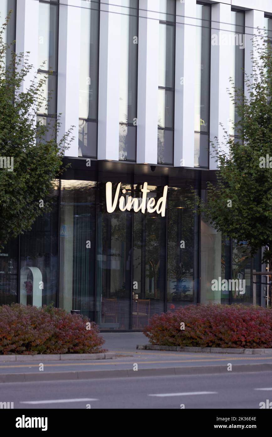 Vinted logo sign on main office, headquarters building wall. Vinted is ...