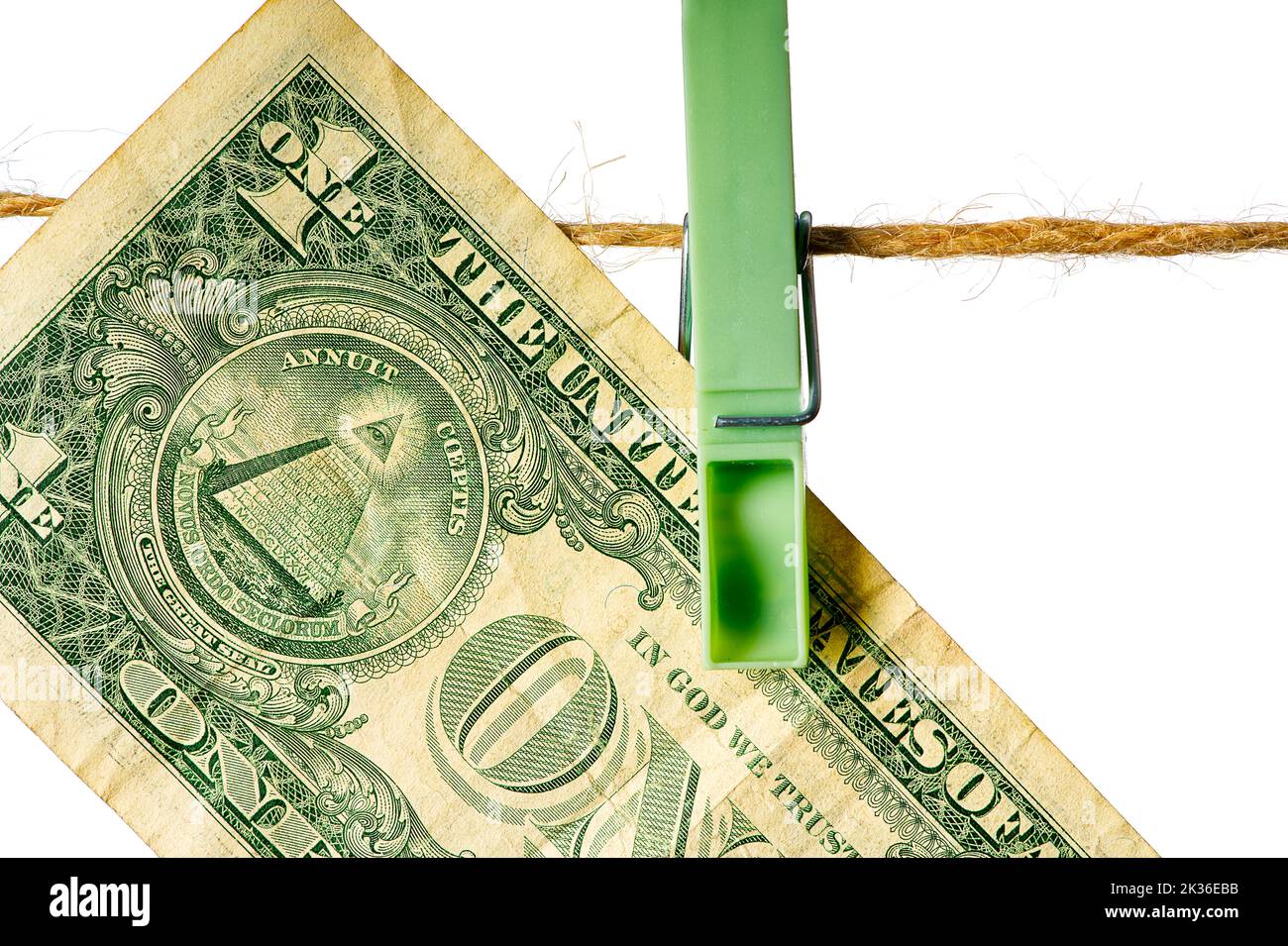 Money laundering. Dollar banknotes hanging on clothesline isolated on ...