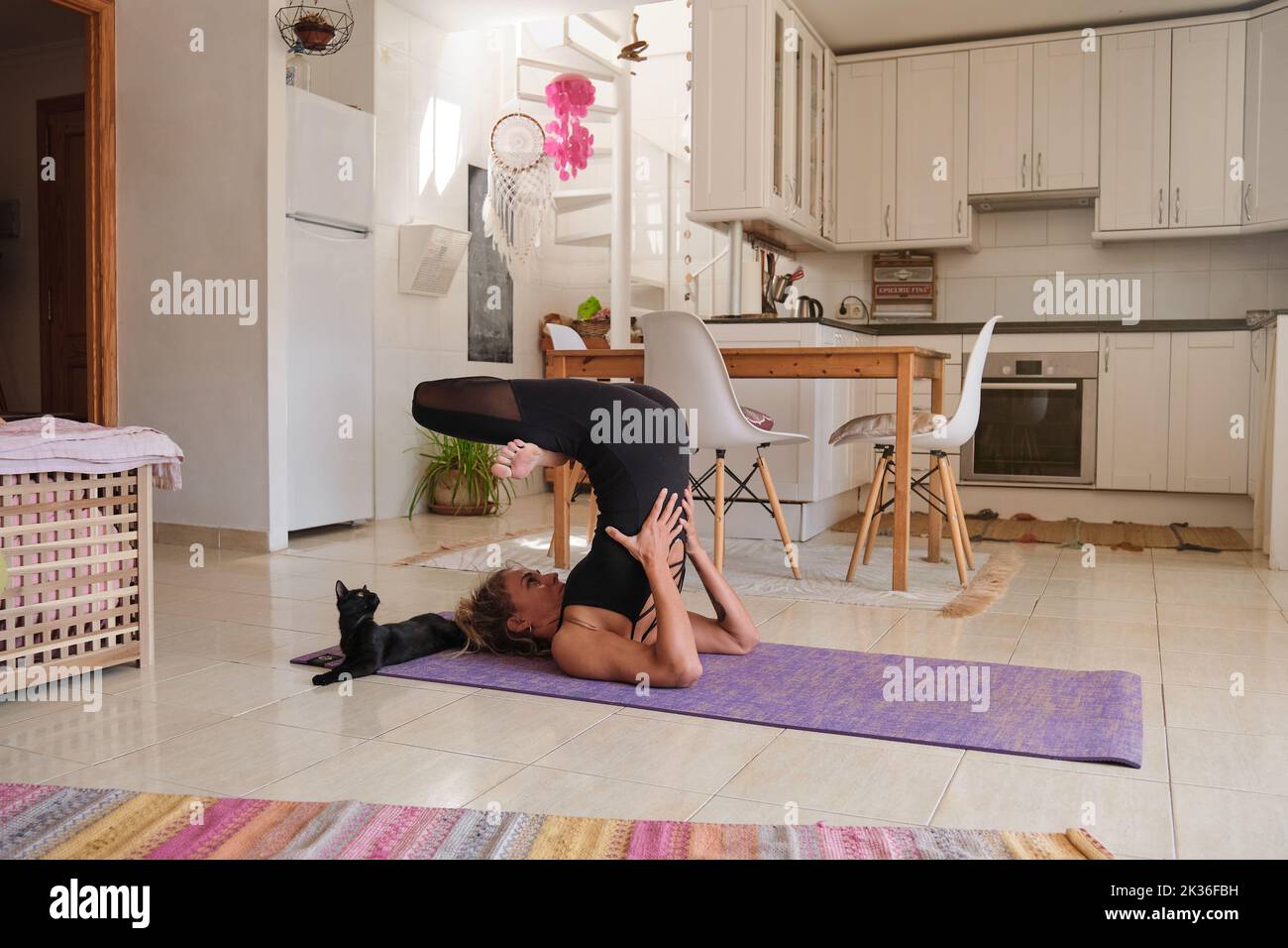 Shoulder stand posture hi-res stock photography and images - Alamy
