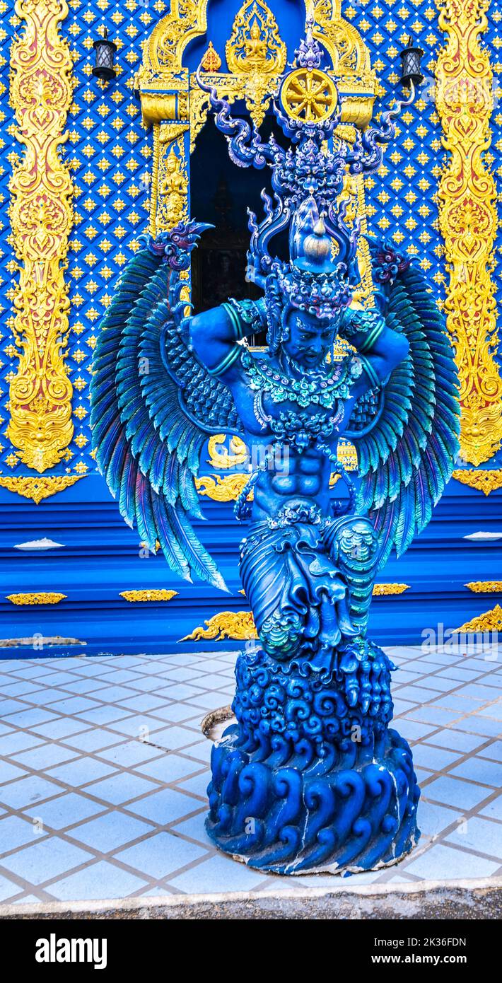 Blue statue of guardian at Wat Rong Suea Ten temple (blue temple) near ...