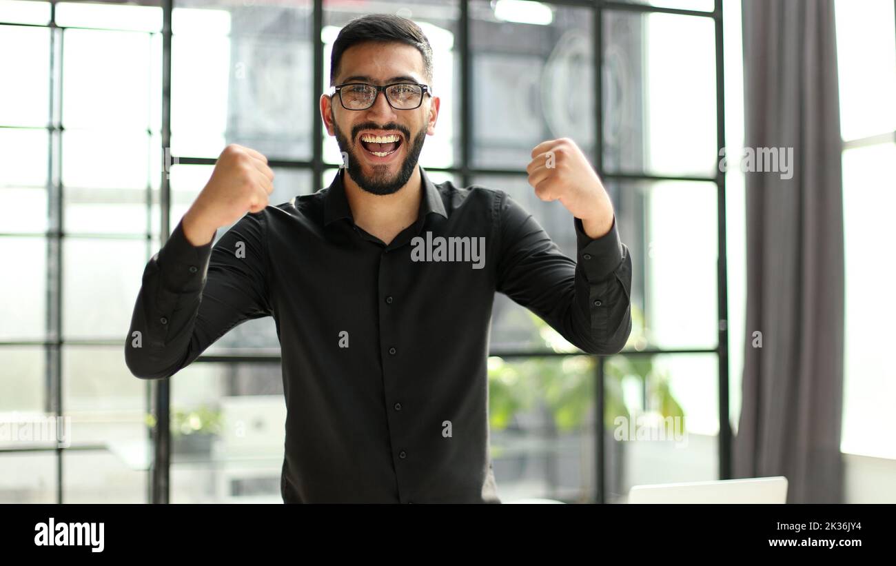 Standing in winner posture hi-res stock photography and images - Alamy