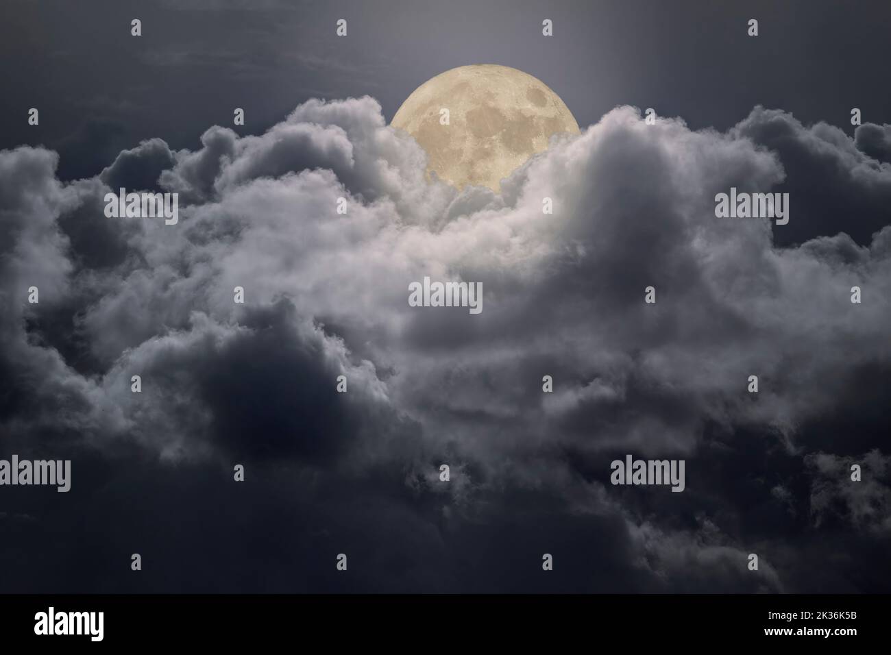 Dark, cloudy ad creepy full moon night Stock Photo - Alamy
