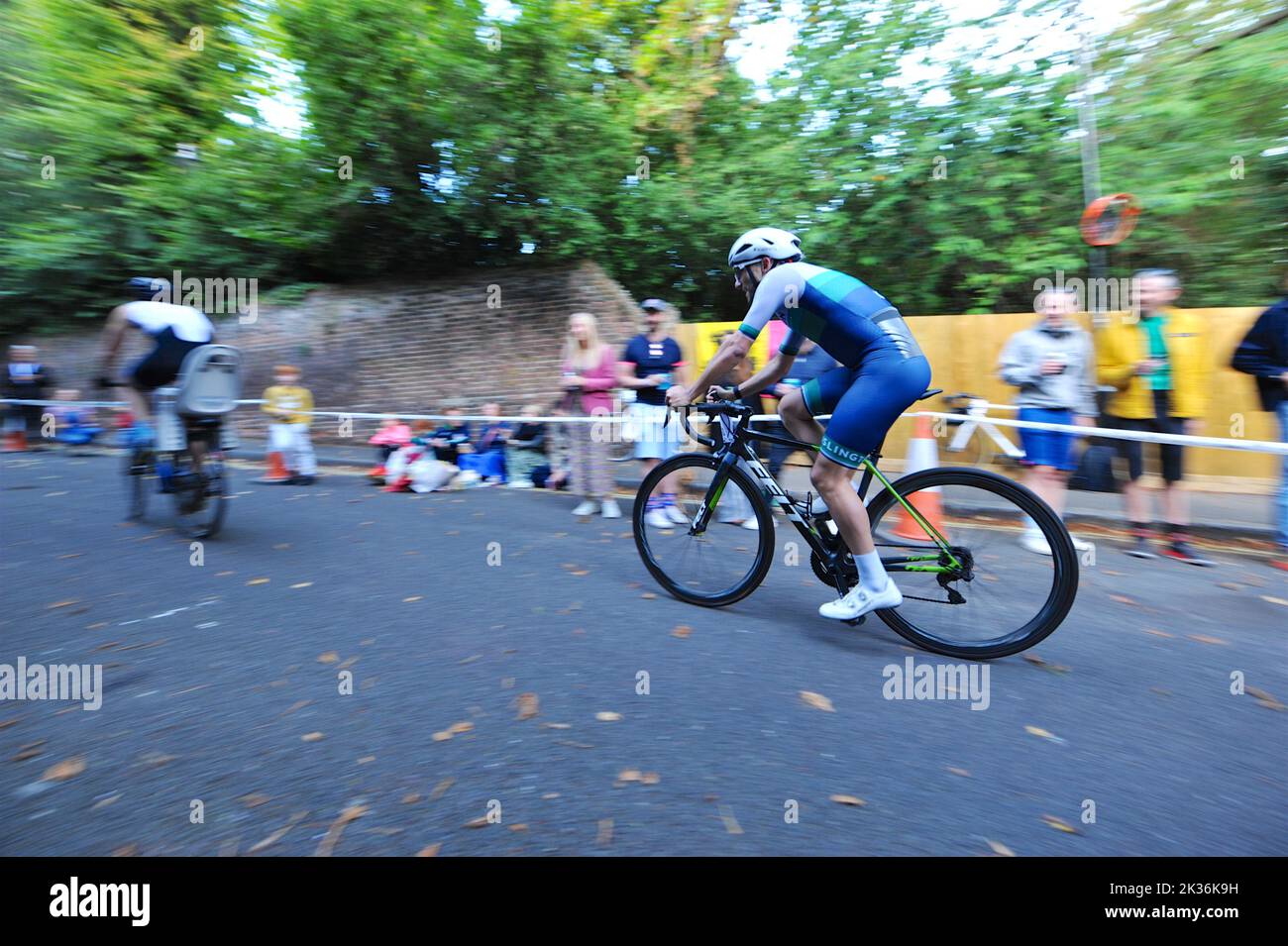 A cyclist straining as they race up Swains Lane in Highgate, London ...