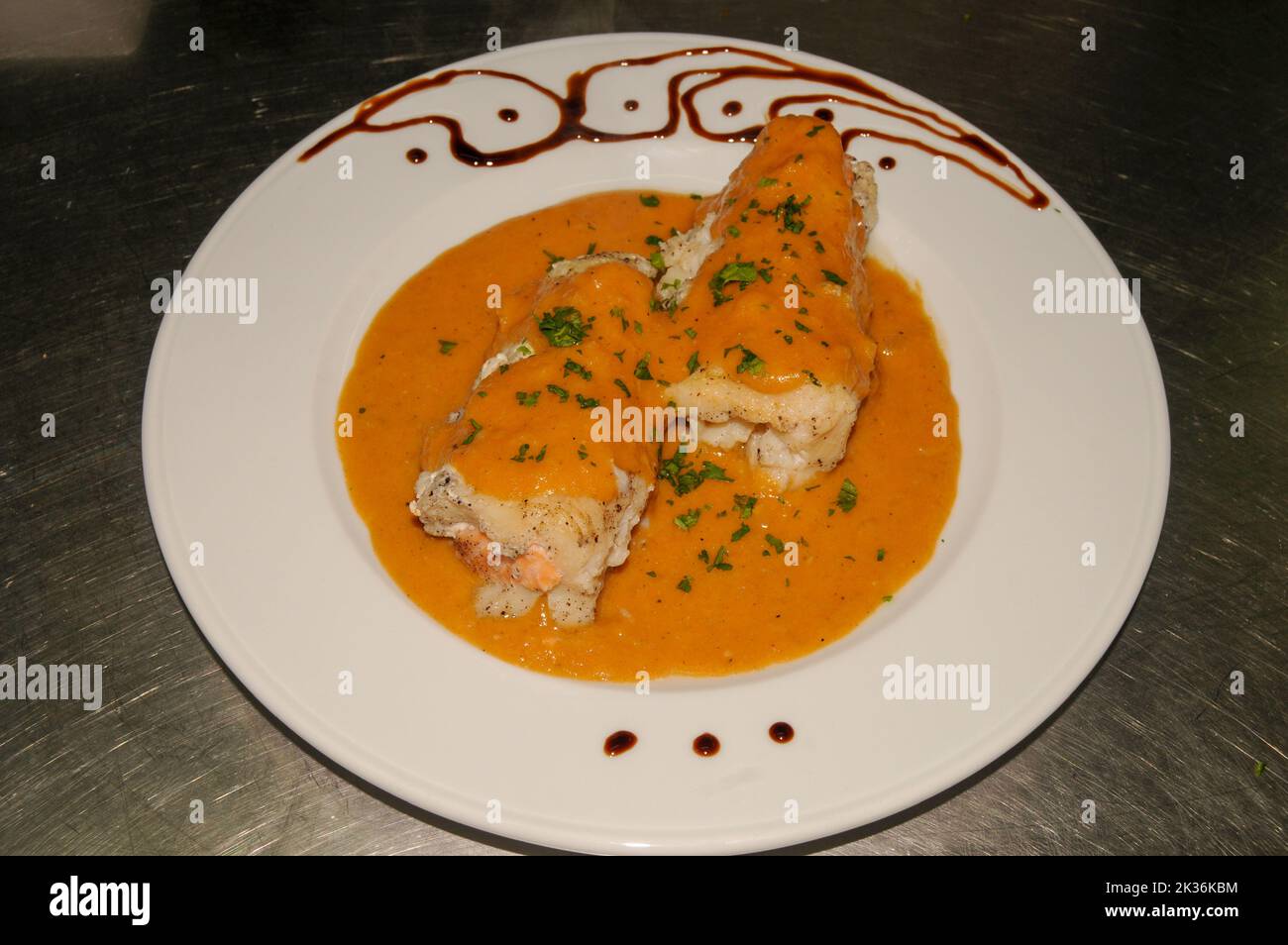 Salmon wrapped in fish fillet Stock Photo - Alamy