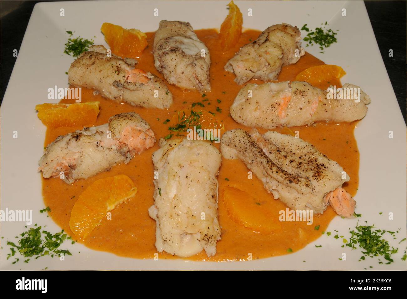 Salmon wrapped in fish fillet Stock Photo - Alamy