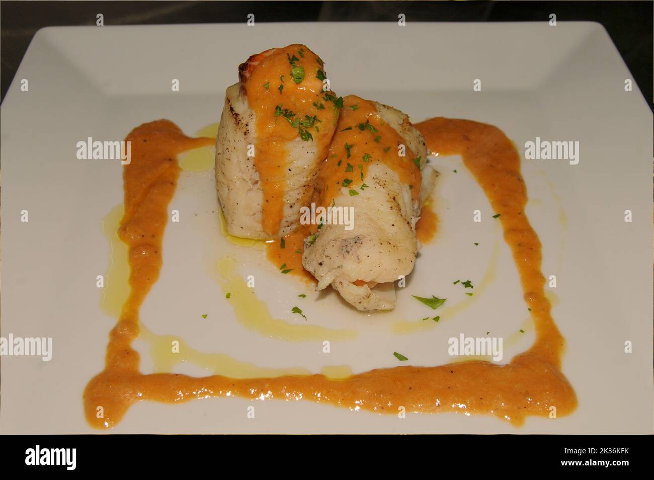 Salmon wrapped in fish fillet Stock Photo - Alamy