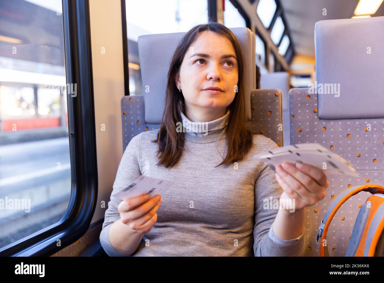 Holding railroad tickets hi-res stock photography and images - Alamy