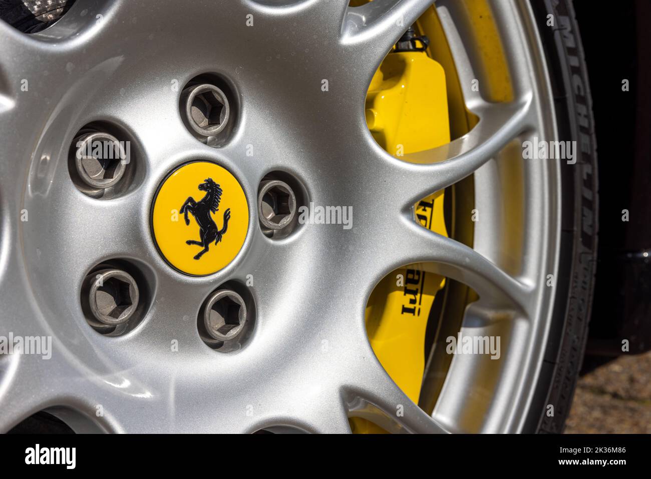 Ferrari F430 alloy wheel with yellow calliper Stock Photo - Alamy