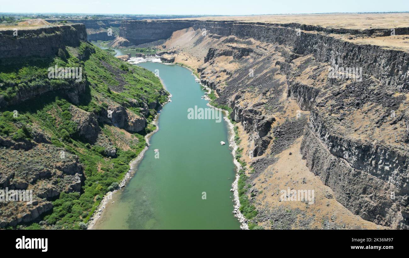 A beautiful landscape of a river between rocks on a sunny day Stock ...