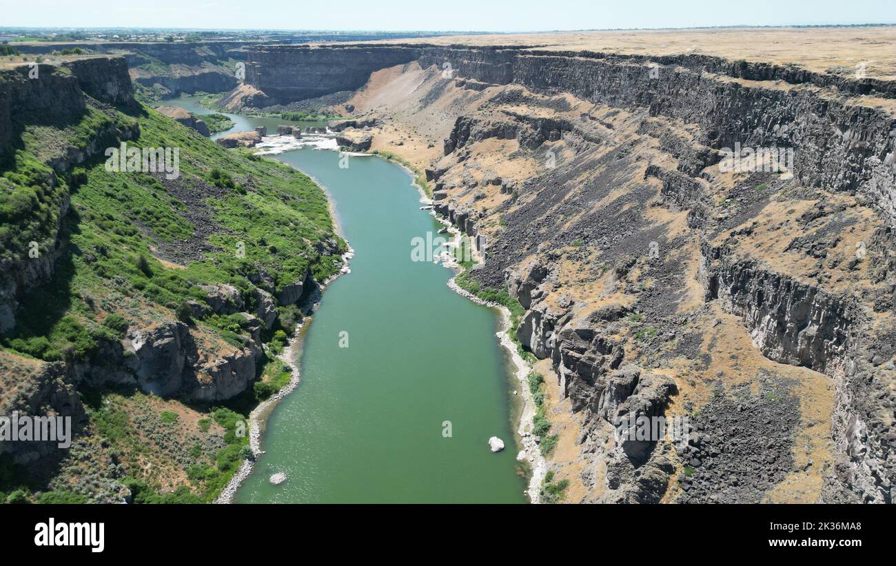 A beautiful landscape of a river between rocks on a sunny day Stock ...