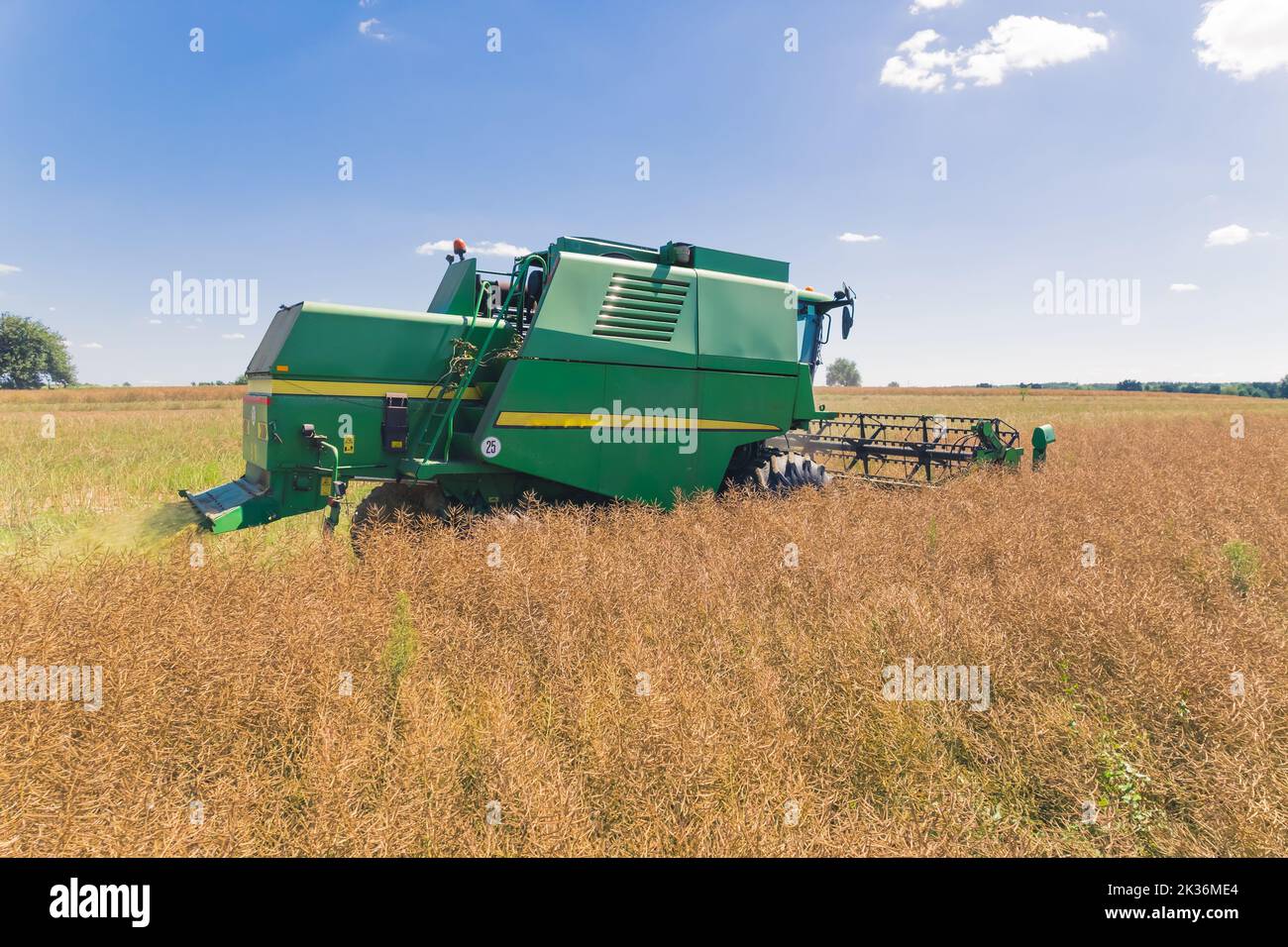 Full length photo green combine hi-res stock photography and images - Alamy