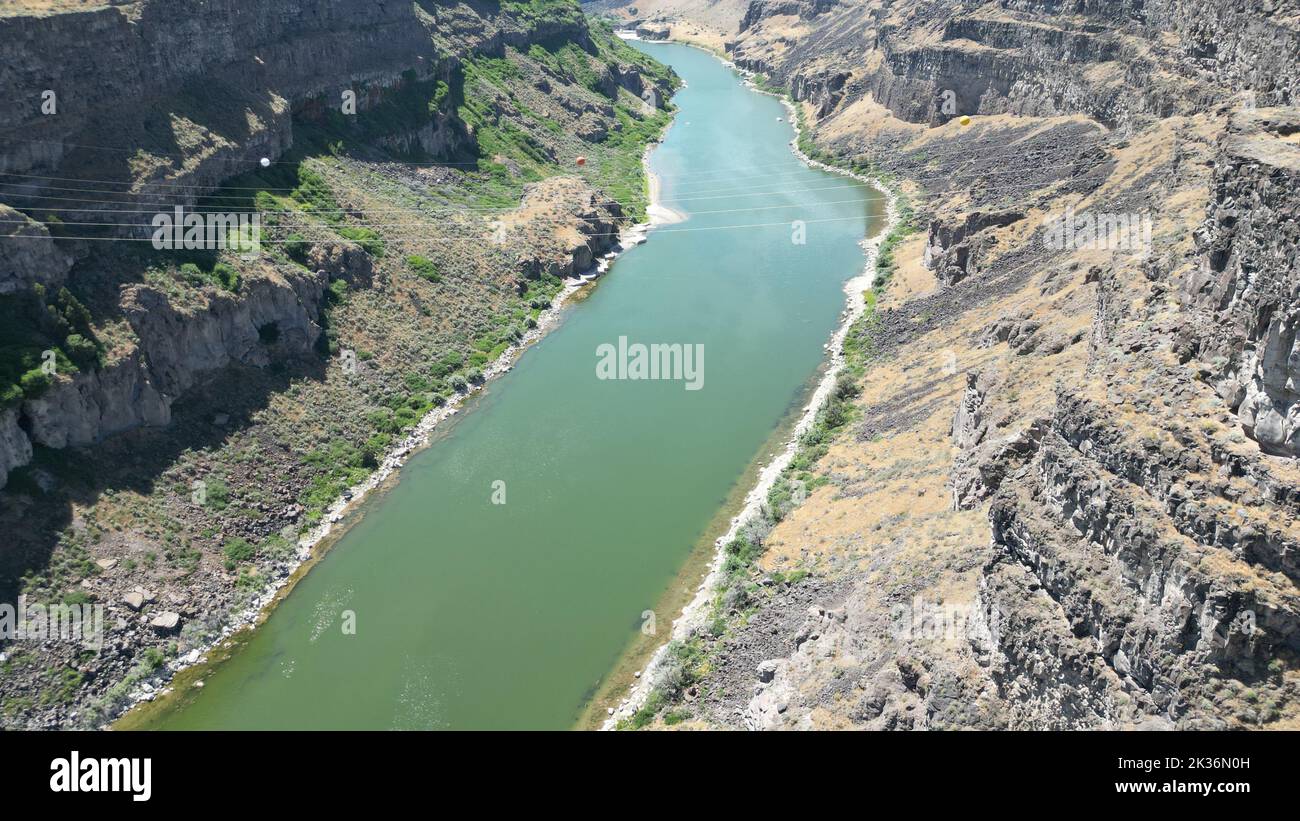 A high-angle shot of rocky cliffs in the Shoshone Falls Park and the ...