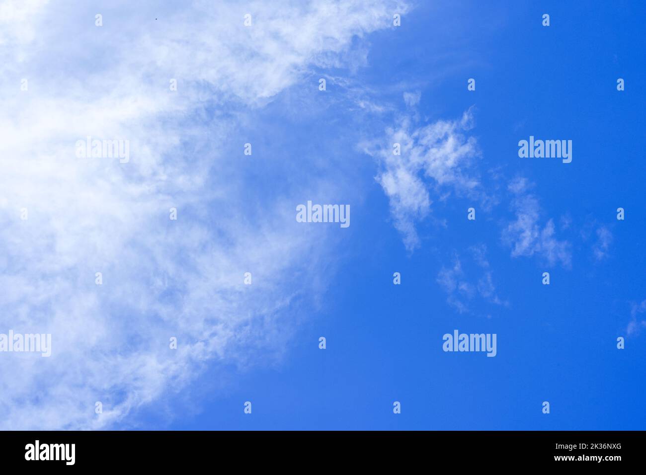 The low-angle view of clouds in the blue sky - beautiful harmonic ...