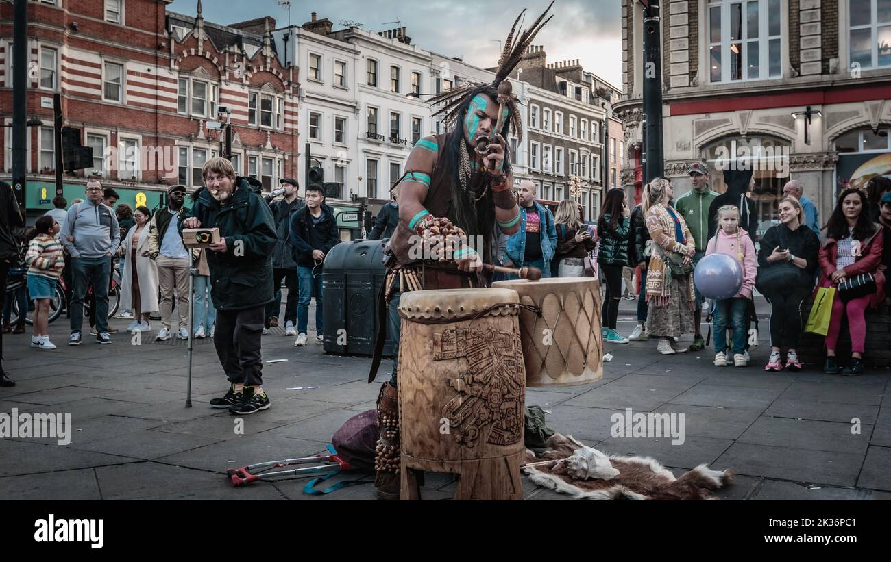 Native american artist busking in London Stock Photo - Alamy