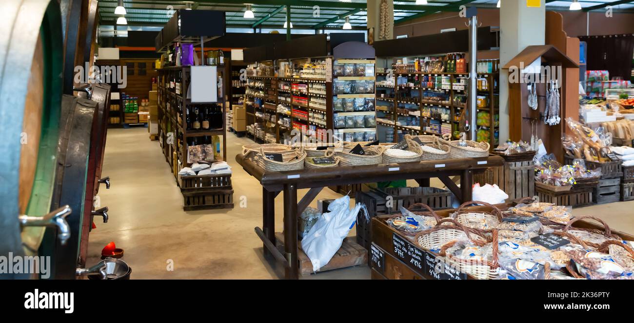 Eco store counter with large assortment of cereals and wine Stock Photo ...