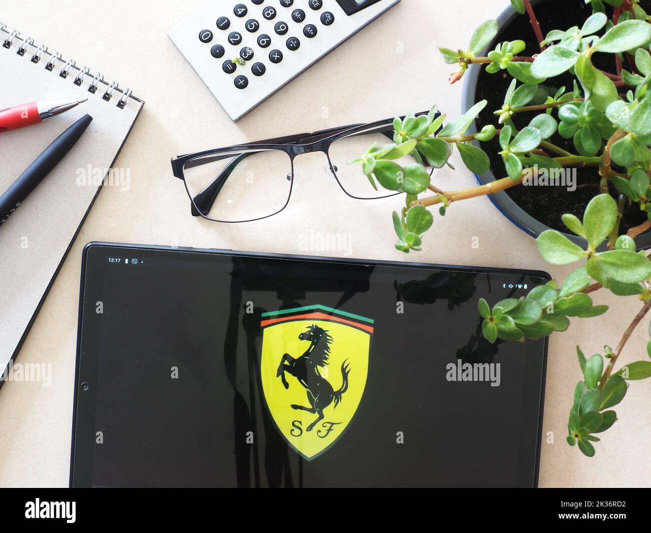 In this photo illustration, Ferrari NV logo seen displayed on a tablet ...
