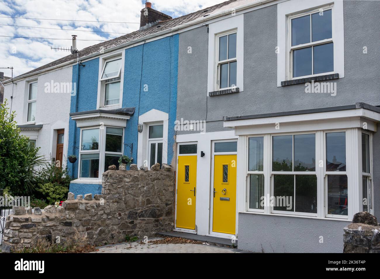 Old fashioned colourful terraced town houses in Carmarthenshire Wales ...