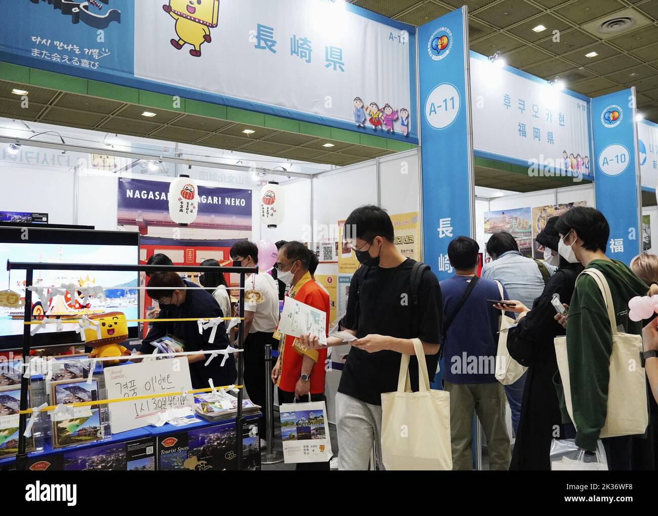 People visit a booth of Nagasaki Prefecture in western Japan at the ...