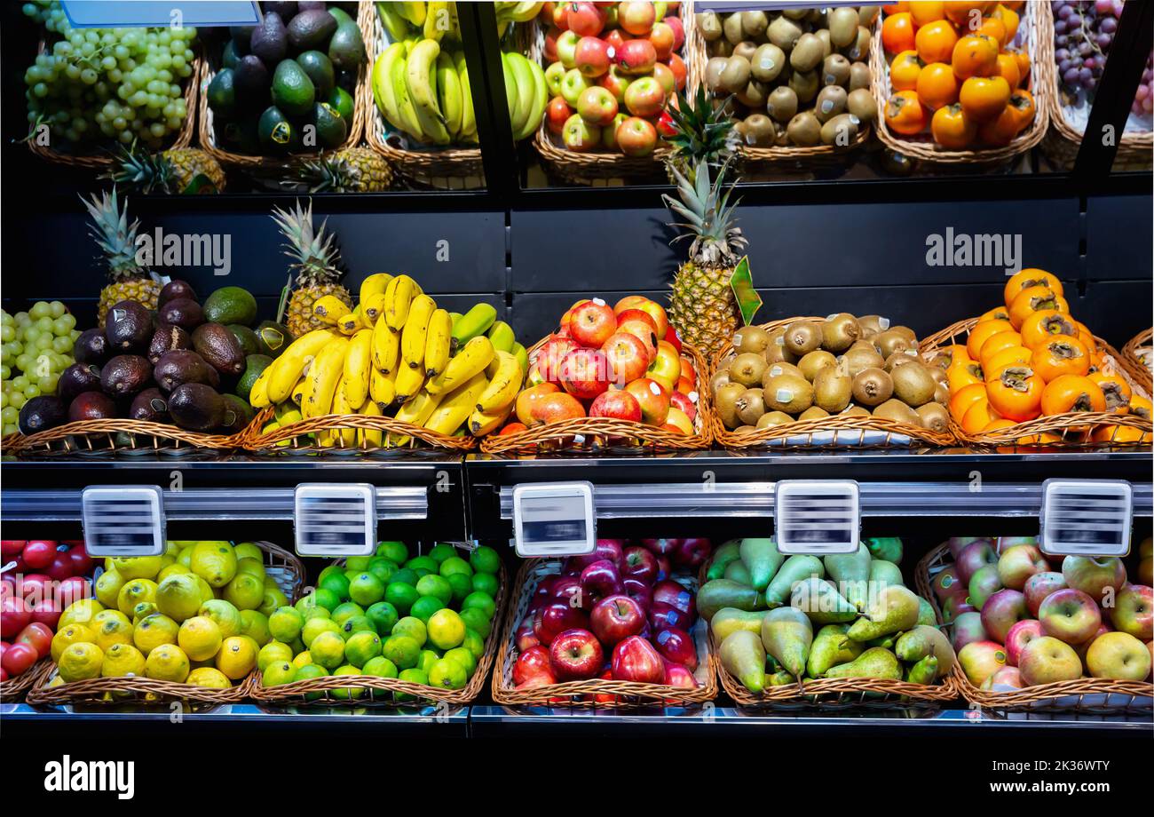 Fresh fruits on shelf of supermarket Stock Photo - Alamy